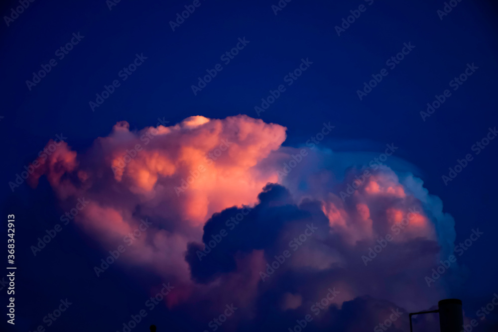 Una gran nube con colores interesantes. Stock Photo | Adobe Stock