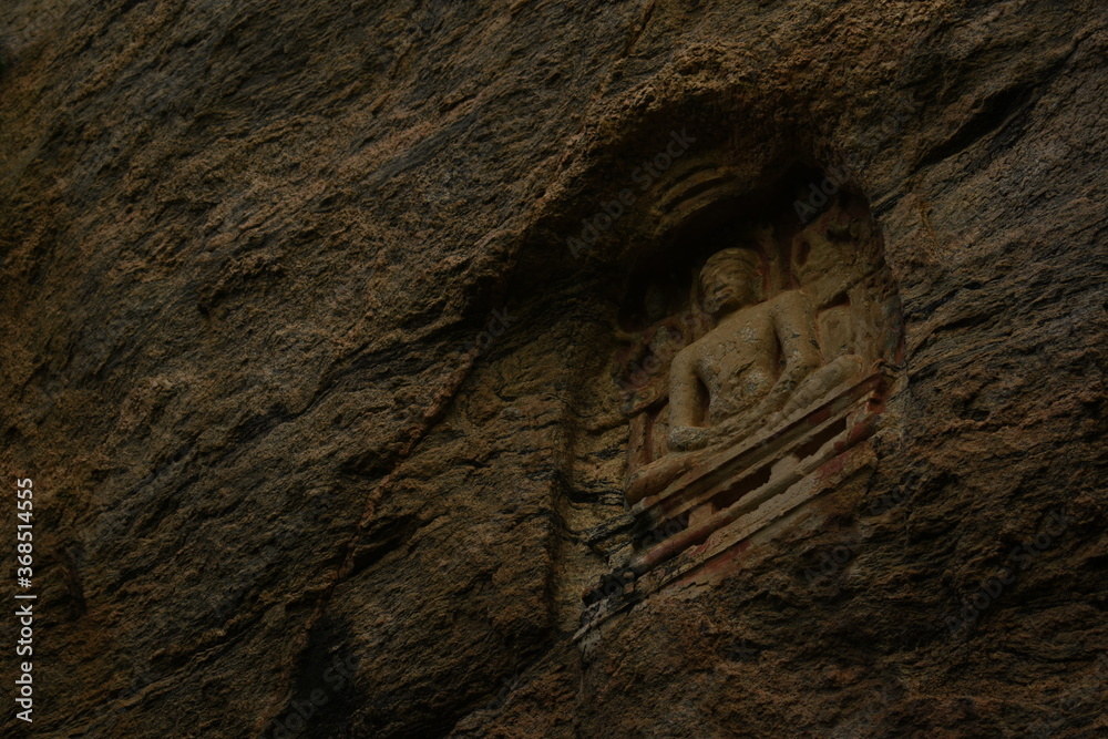 Ancient carvings of Jainism on the rock from the Jaina Caves, tamilnadu ...