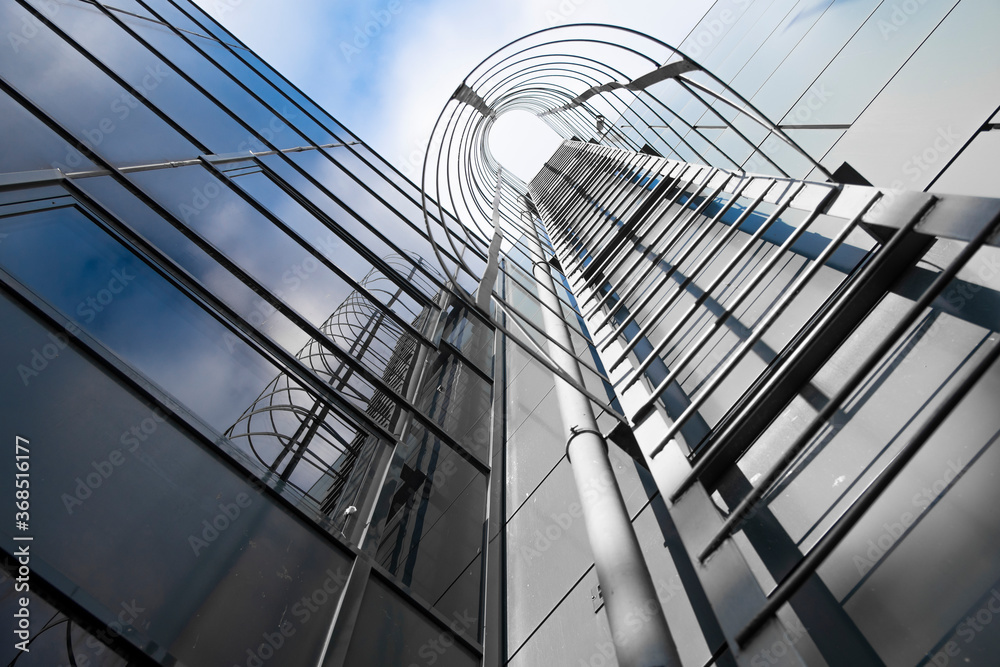 fire escape on a high glass building. fire safety. the geometry of the ...