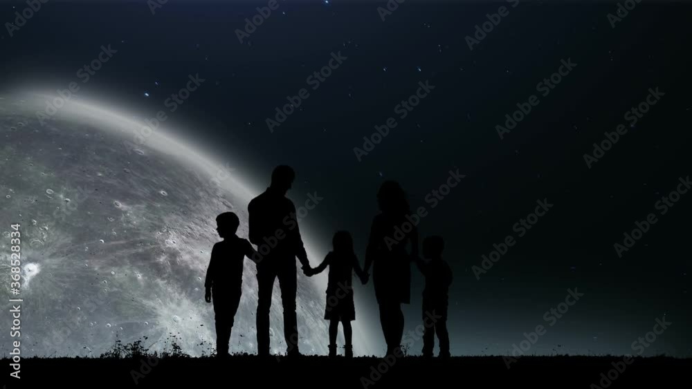A Silhouette of a Family Watching on the Slowly Spinning Moon Around of ...
