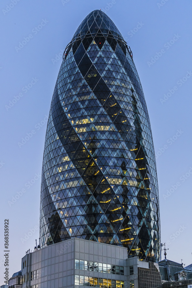 View of Gherkin building (30 St Mary Axe) at night. Gherkin - iconic ...