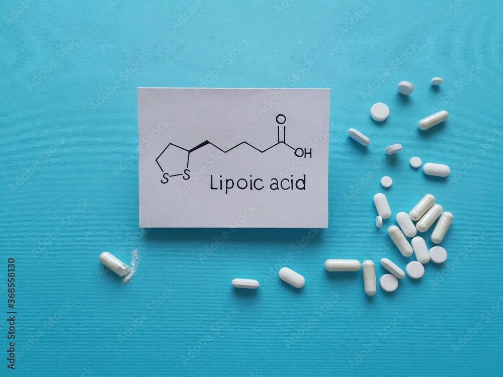 Structural chemical formula of alfa lipoic acid molecule with pills ...