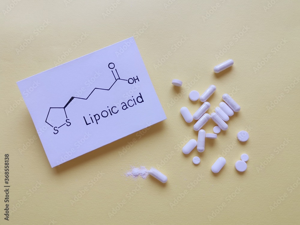 Structural chemical formula of alfa lipoic acid molecule with pills ...