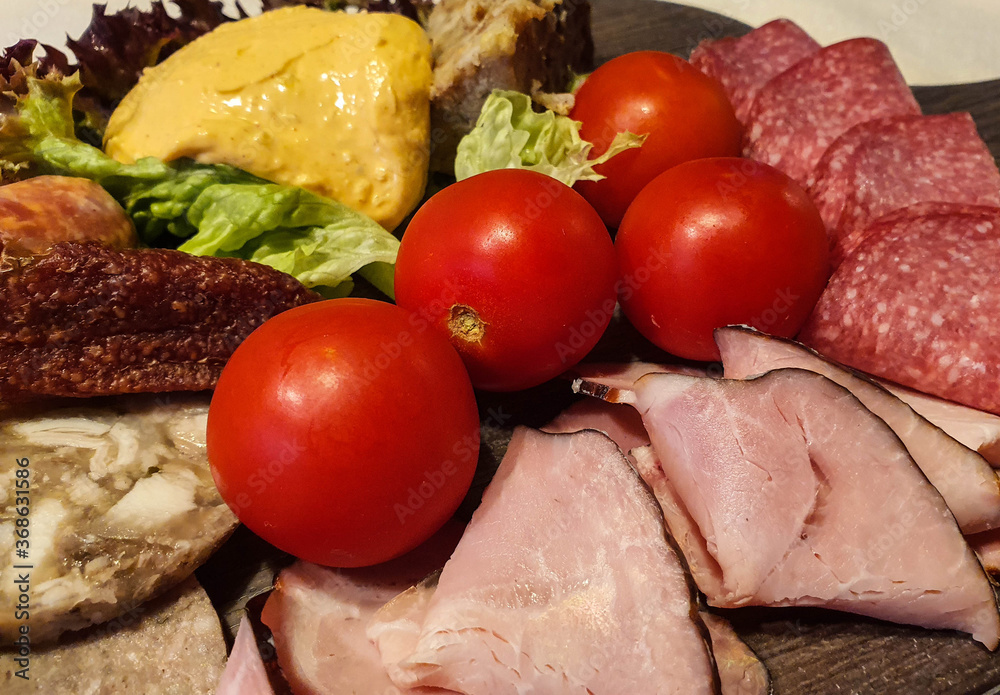 Vesper board with traditional german sausage, cheese and tomatoes Stock ...