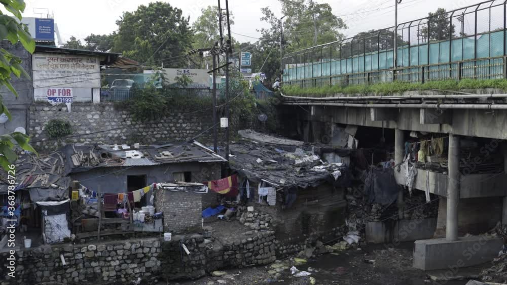 Stockvideon Slum areas of India. Poverty in India, dirty drain | Adobe ...