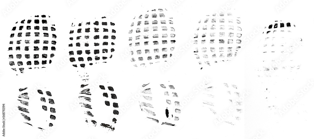 macro photo of different human sneaker walking footprints of the left ...