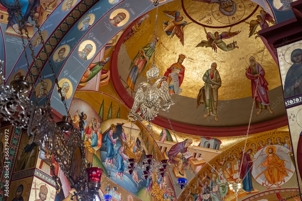 The large golden double-headed eagle atop a chandelier in the main hall ...