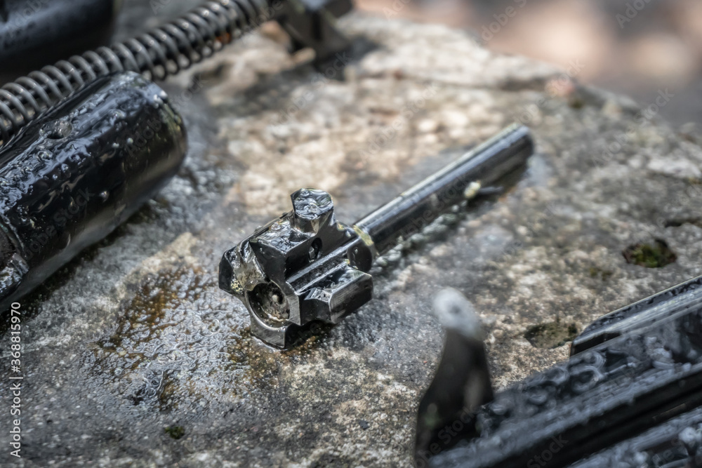 The shutter of the AK 74 submachine gun in disassembled condition ...