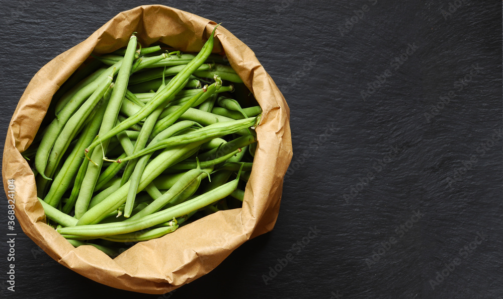Photography of green beans in a brown paper bag on slate background for ...