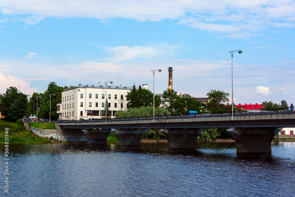 Old city bridge over bay on lake in old small town in summer Stock ...