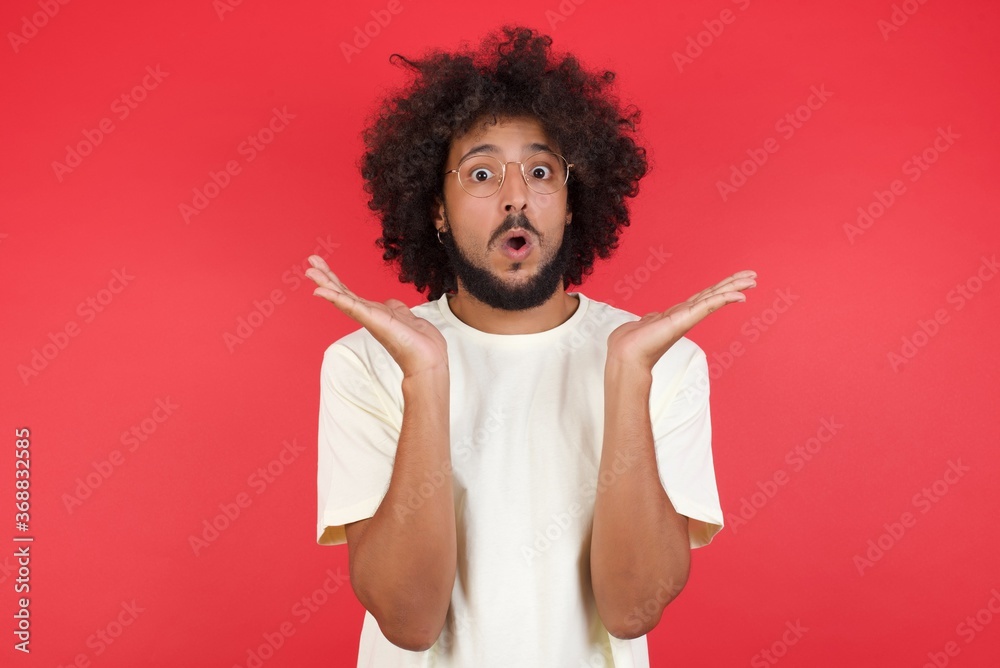 Surprise concept. Portrait of astonished handsome young man looking ...