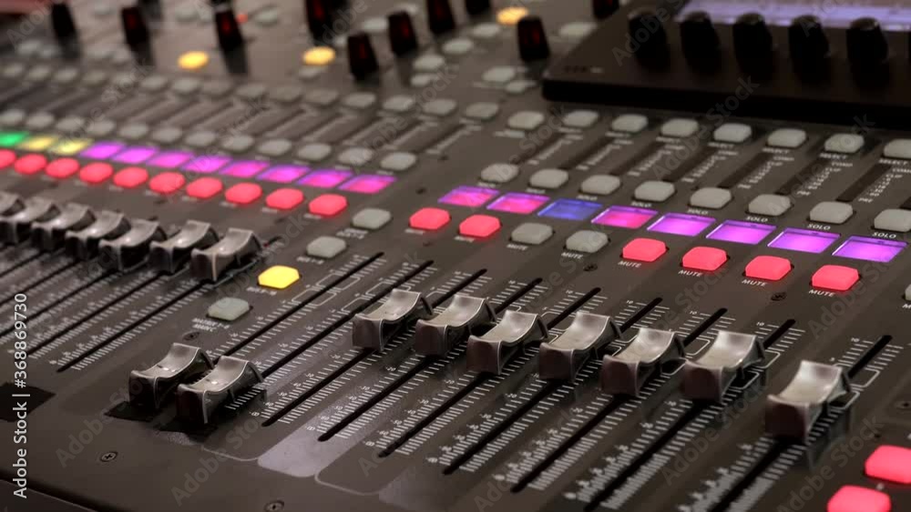 Remote control for adjusting the sound. Audio mixer. Sound engineer ...