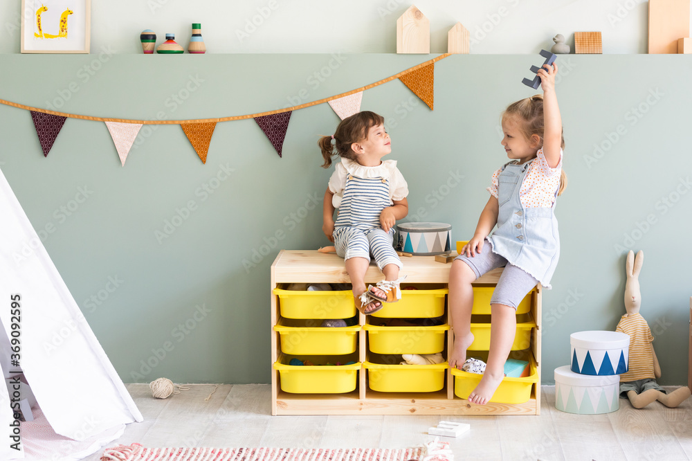 Little Girls Playing Guess Who Stock Photo | Adobe Stock