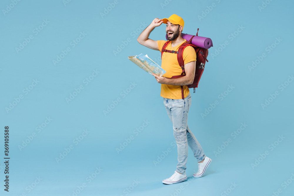 Full length portrait of excited young traveler man with backpack ...