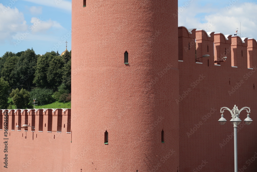 Corner tower with different heights of adjoining walls, loopholes ...
