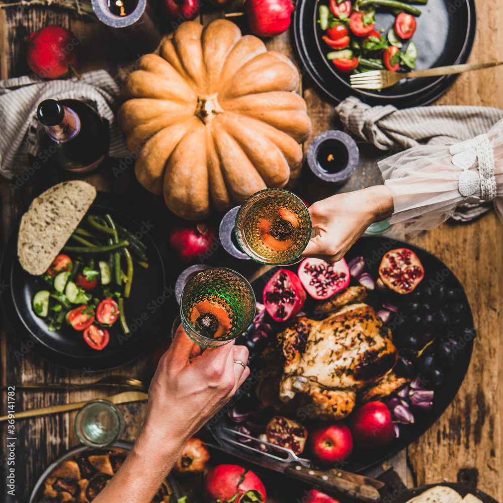 Thanksgiving table setting. Flat-lay of couple celebrating holiday with ...