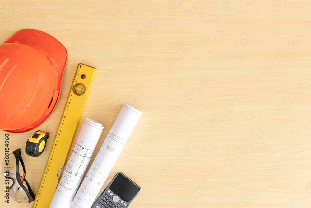 Top view engineer desk light brown wood texture have roll home plan and ...