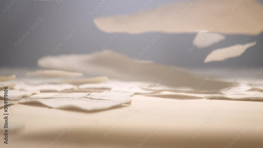 Dead skin cells peeling away from dry skin, forward macro animation ...