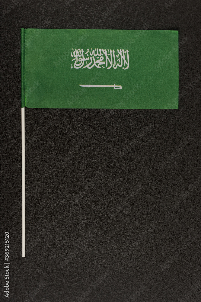 Desktop flag of Kingdom of Saudi Arabia on black background. Green flag ...
