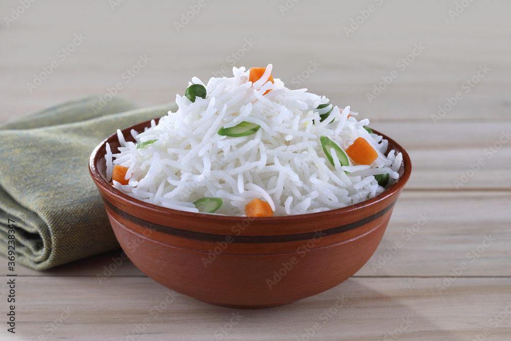 Cooked Basmati rice in a bowl. Indian Basmati rice is known for aroma ...
