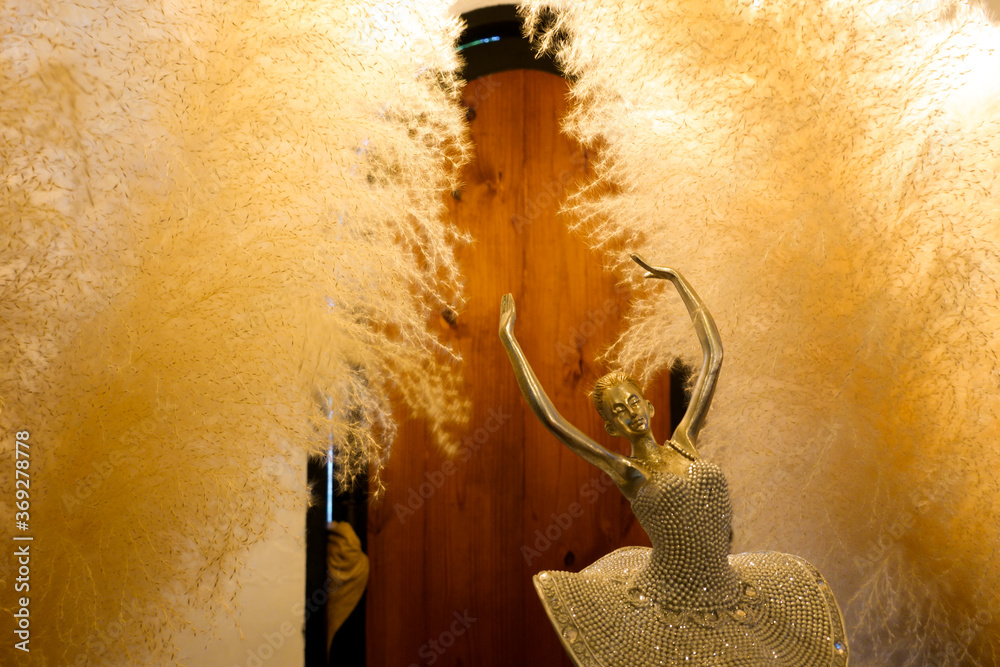 Luxury ballet girl figure made from gold metal while wear diamond dress ...