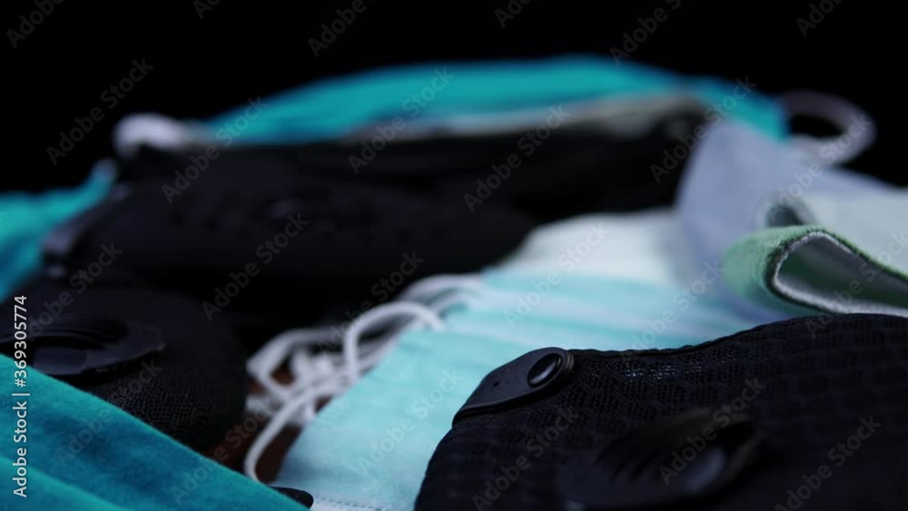 Background full of disposable and washable masks for disinfection and ...