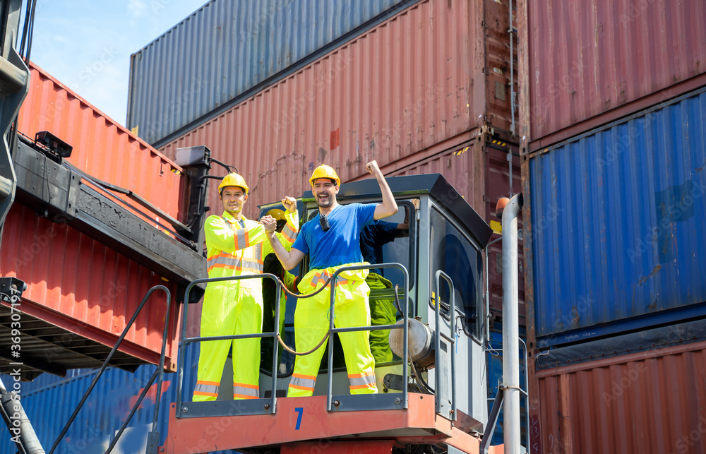Foreman and container worker shaking hands at container cargo,Business ...