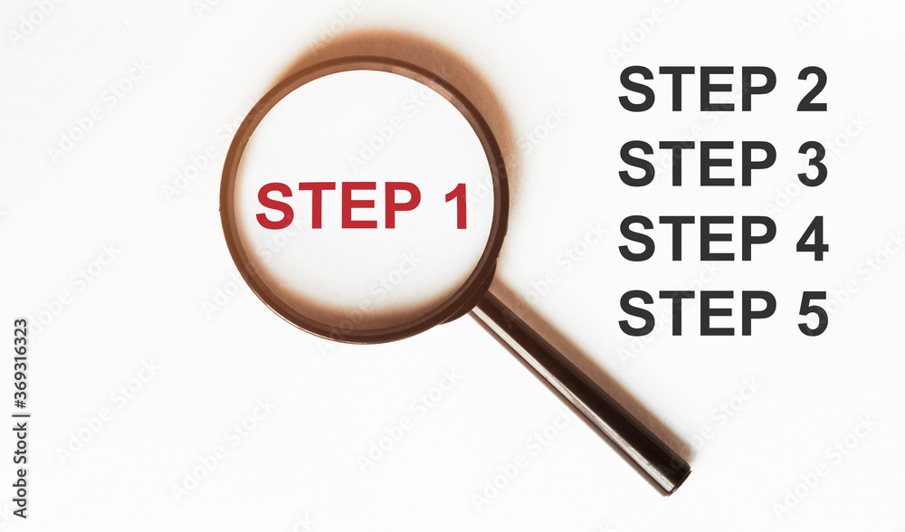 Step 1, 2, 3, 4 and 5 on a sheet under a magnifying glass Stock Photo ...