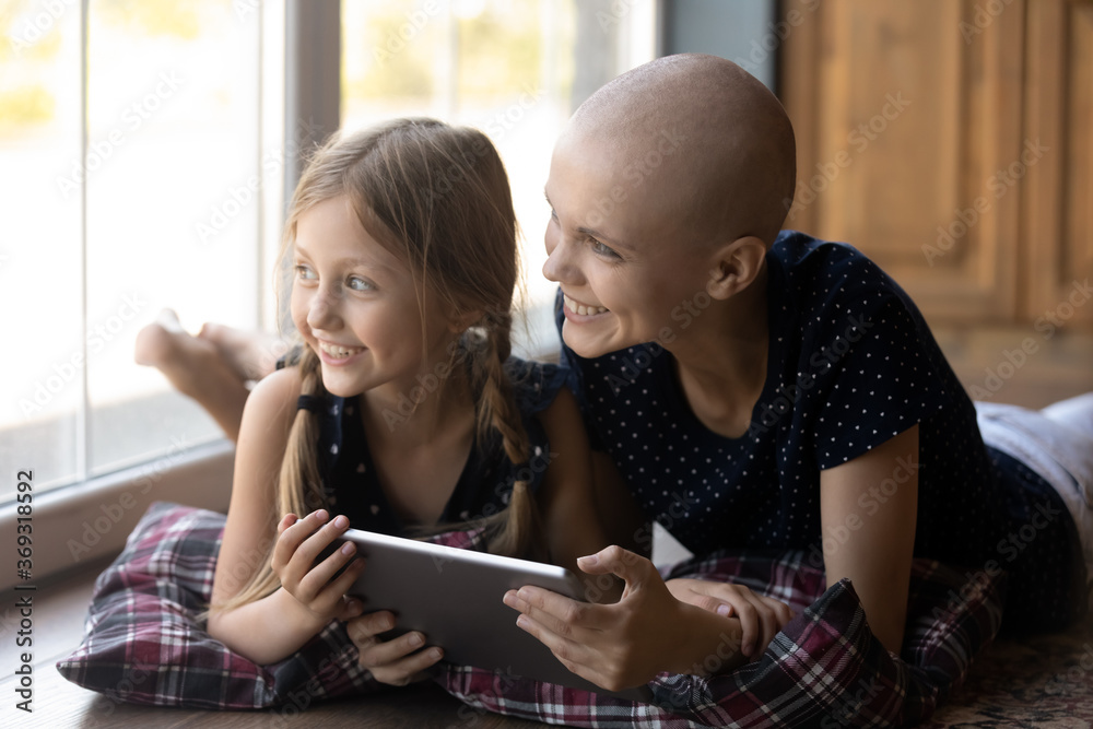 Happy young Caucasian sick cancer patient bald hairless mom and little ...