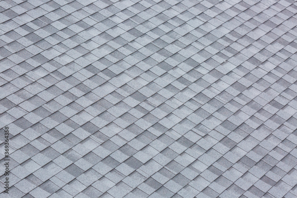 Installation of roof asphalt shingles. Bitumen roof shingles texture ...