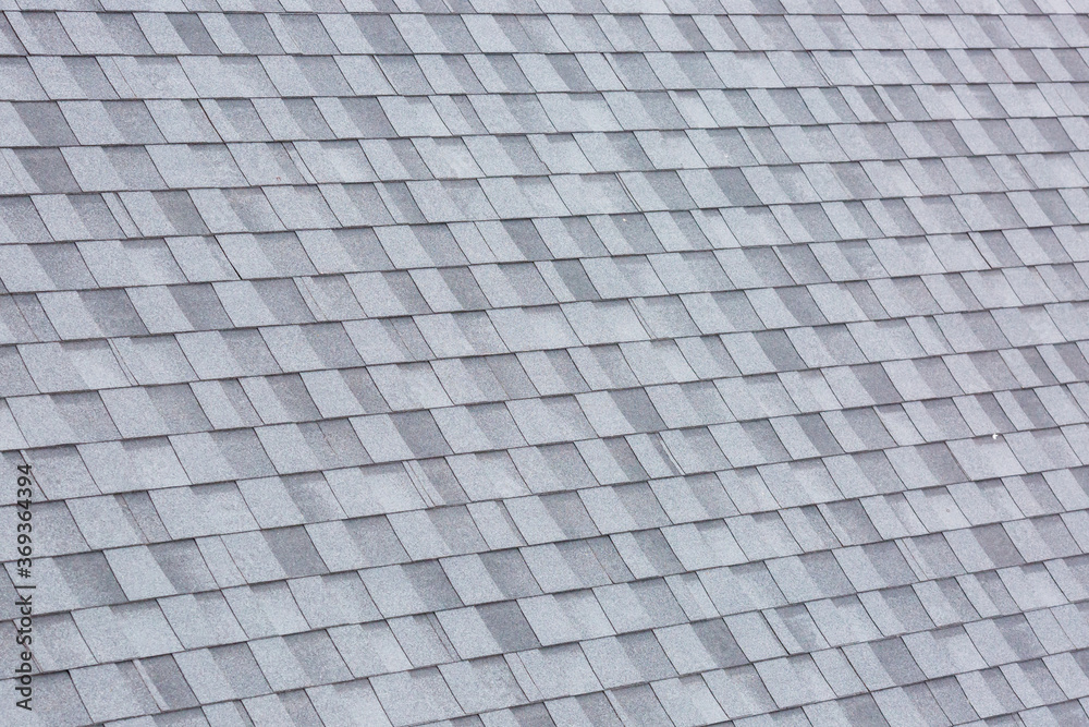 Installation of roof asphalt shingles. Bitumen roof shingles texture ...