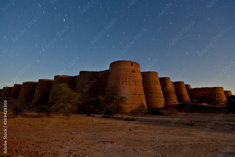night photography of old historical buildings in desert area of ...