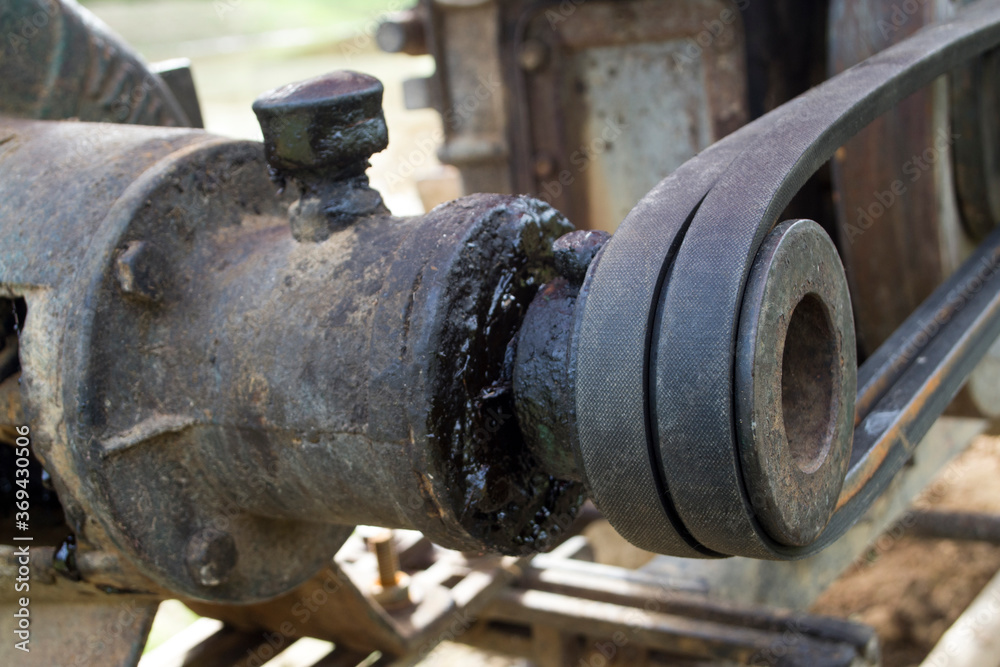 Pulleys and power transmission belts are installed in the engine. Stock ...