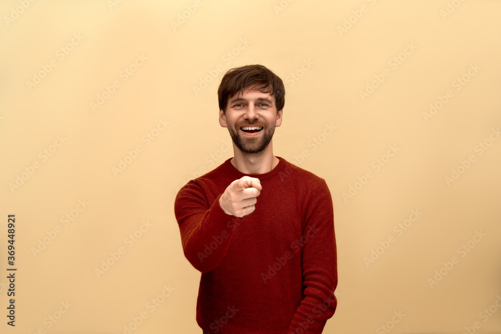 Mock, funny joke. Photo of young man with beard wearing sweater ...