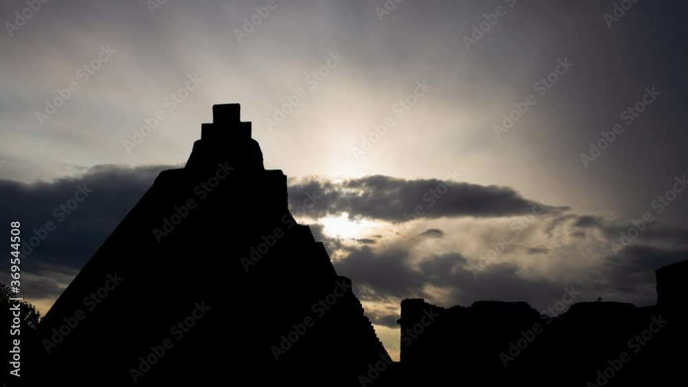 Maya Pyramid in Uxmal, Time Lapse at Sunrise with Fast Clouds and Dark ...