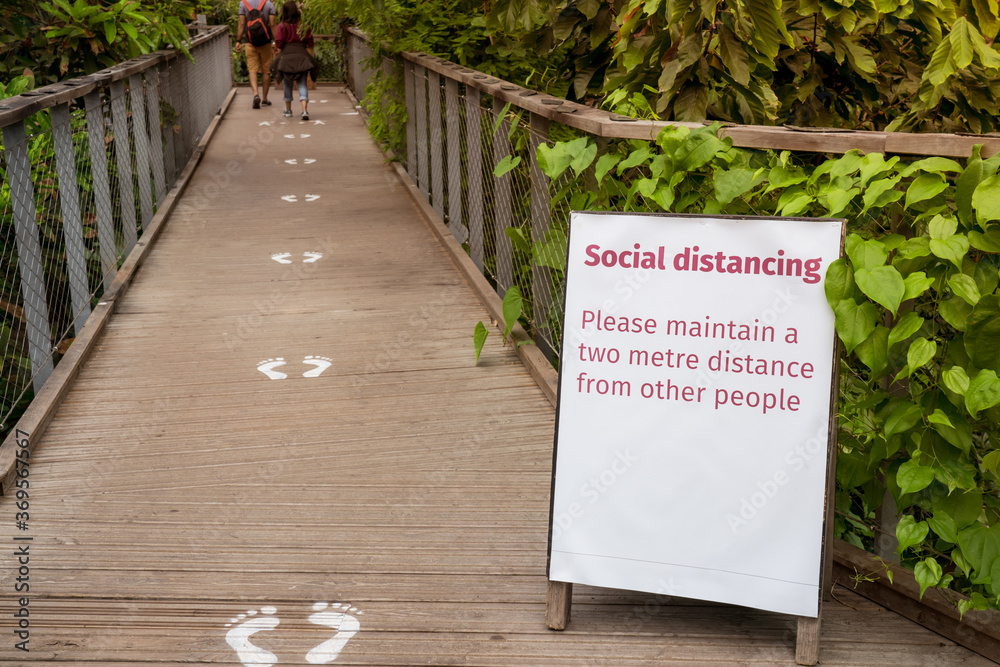 View of footprint sign for stand in lift. Social distancing with COVID ...