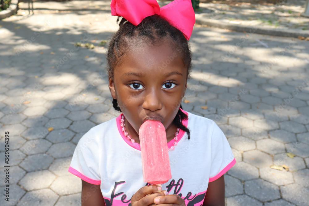 Woman Eating Popsicle