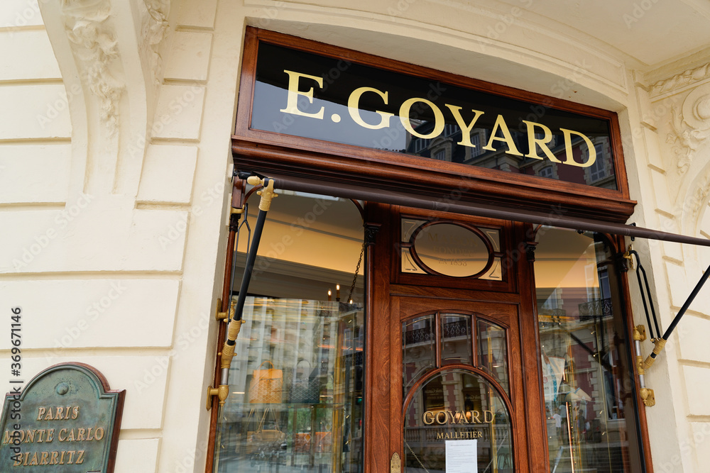 Goyard sign and text logo of luxury shop from Paris with wooden facade ...