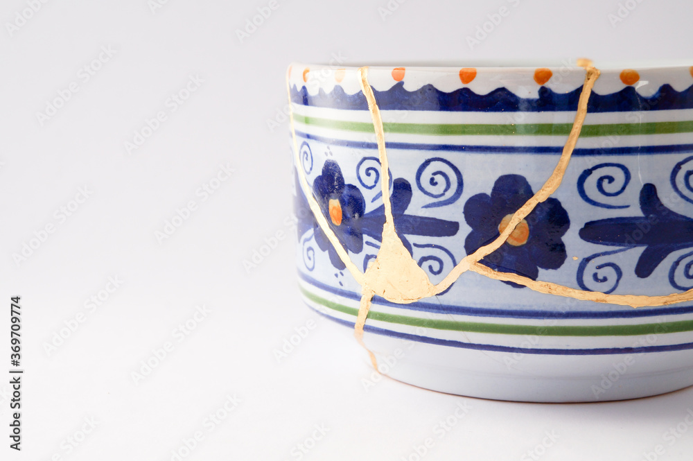 Vintage Italian pottery restored with kintsugi technique. Stock Photo ...