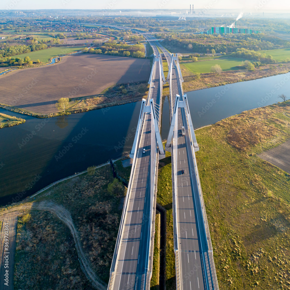 New modern double cable-stayed bridge with wide three-lane roads over ...