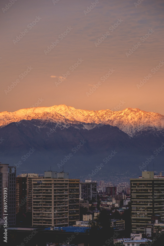Amazing golden sunset sky over Santiago and Los Andes mountains with a ...
