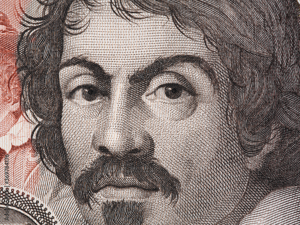 Caravaggio portrait on 100000 italian lire banknote closeup macro. One ...