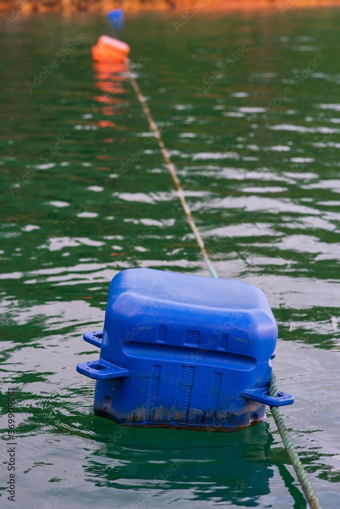 raft a flat buoyant structure of plastic box used as a floating ...