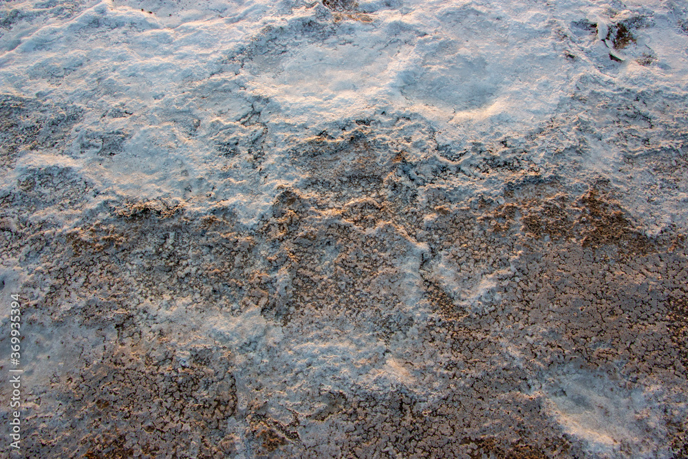 Salty sea shore.Texture of sea salt farm is the place with so much sea ...