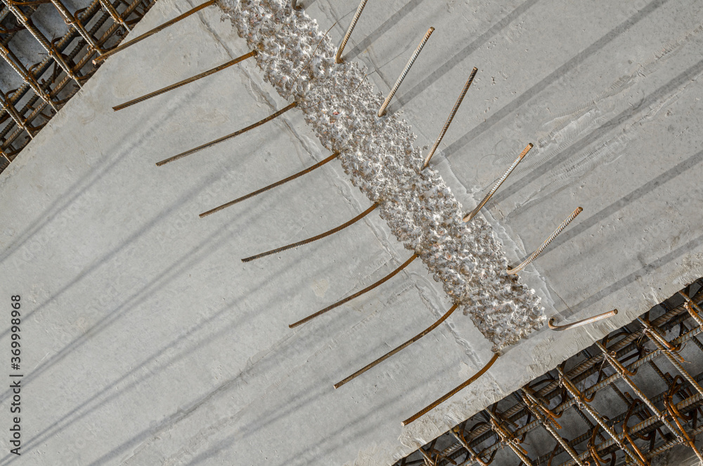 Close-up view of a huge construction surrounding wall or tilt-up panel ...