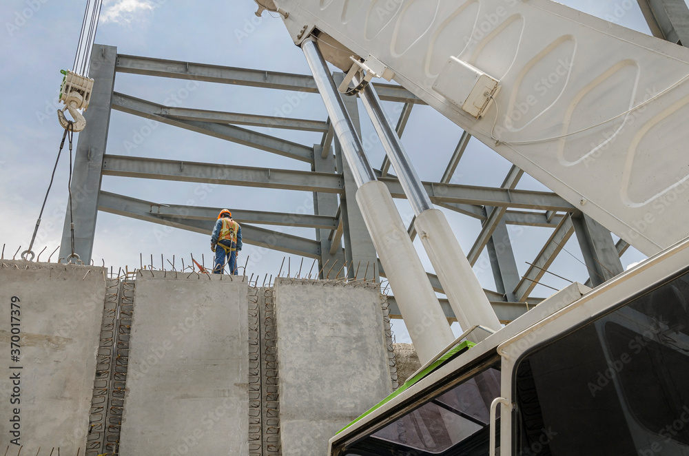 Construction site with metal girders and tilt-up cement panels Low ...