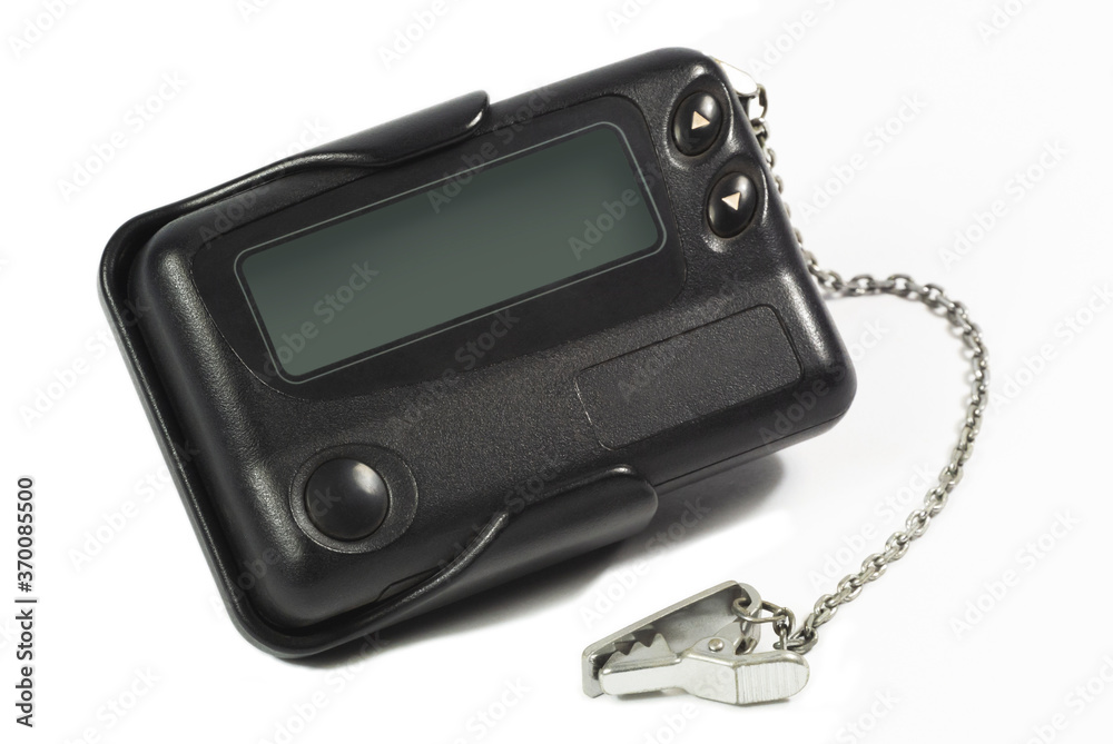 One old black pager or one beeper isolated on white background with ...