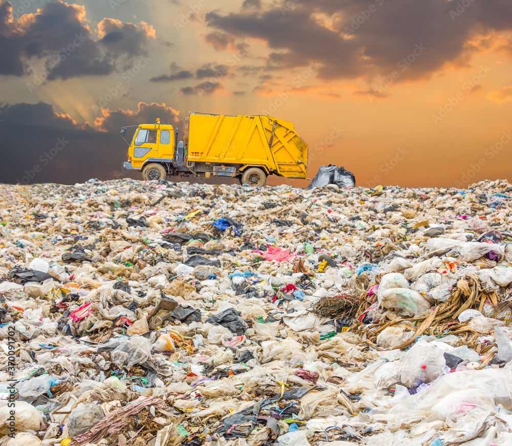 garbage dump pile in trash dump or landfill,truck is dumping the gabage ...