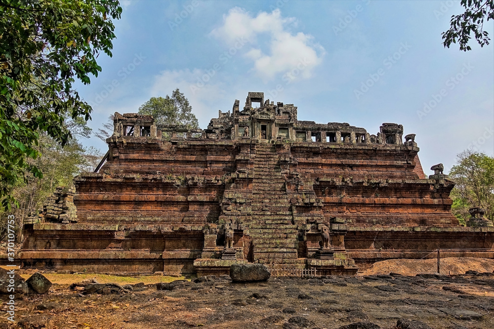 Ancient temple in Cambodia. Against the background of the blue sky ...