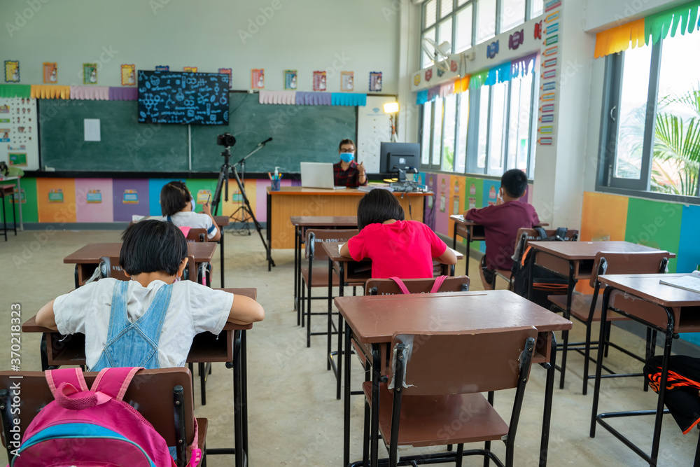 Elementary school wear mask for protect corona virus with teacher in ...